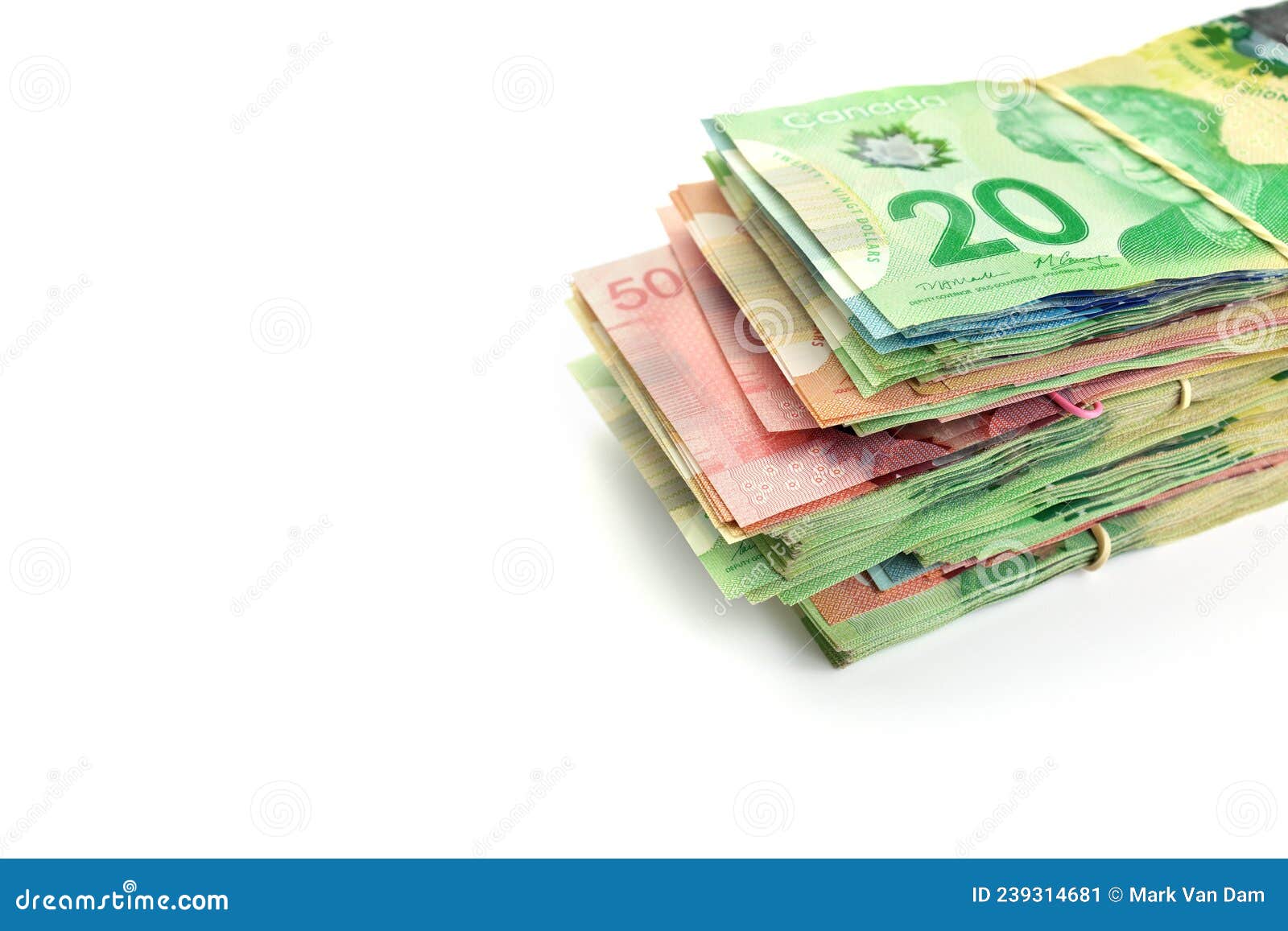 High Angle View of Large Stack of Canadian Banknotes on a White ...