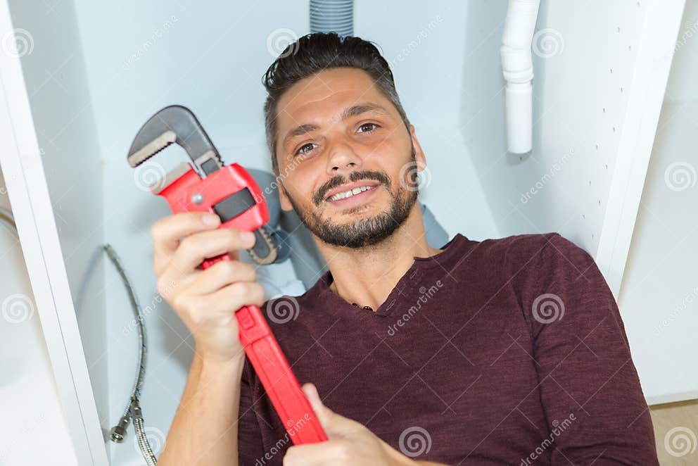 High Angle View Man Fixing Sink Pipe in Kitchen Stock Image - Image of ...