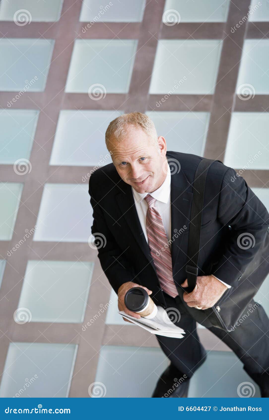High Angle View of Man Standing with Briefcase Stock Image - Image of ...