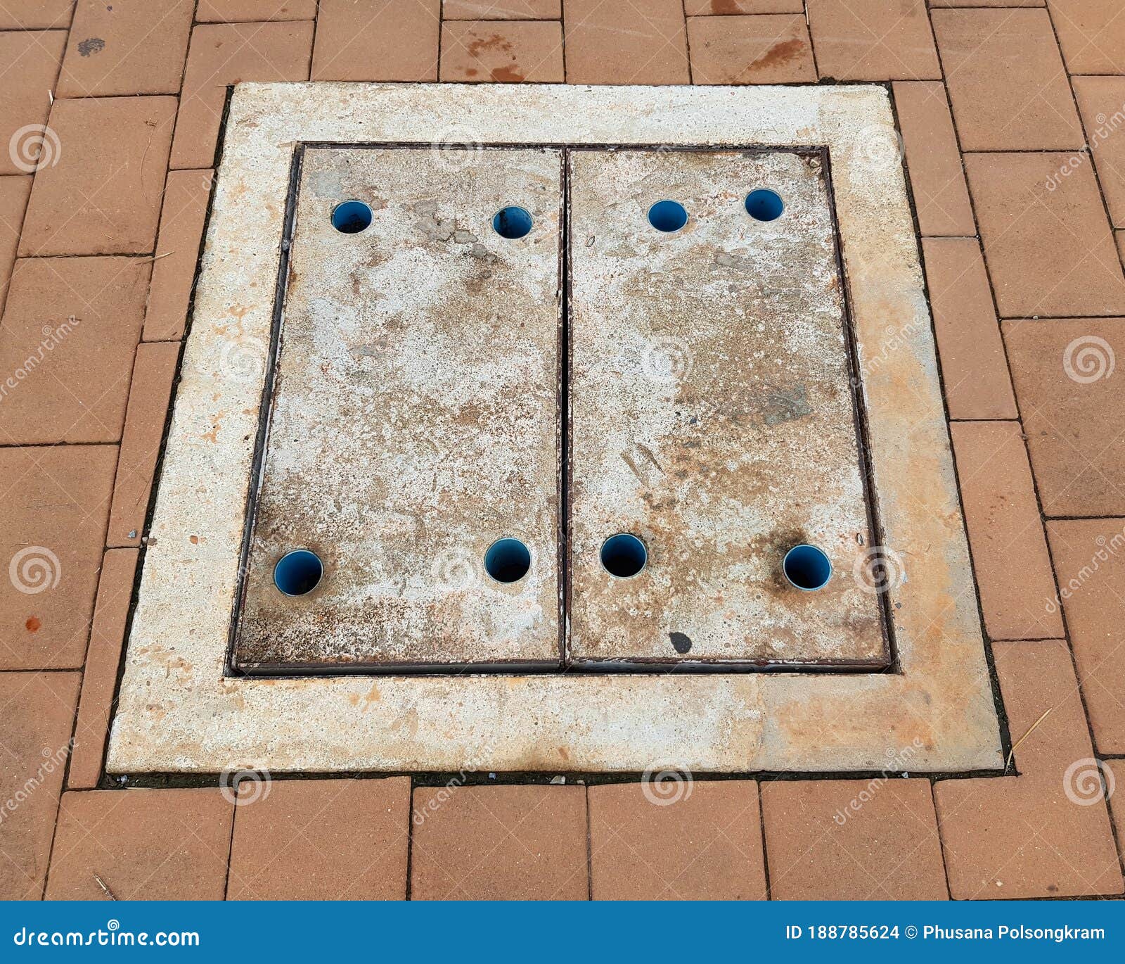 Top View Of A Manhole Cover On Drainage Or Sewerage Under Paved Road ...