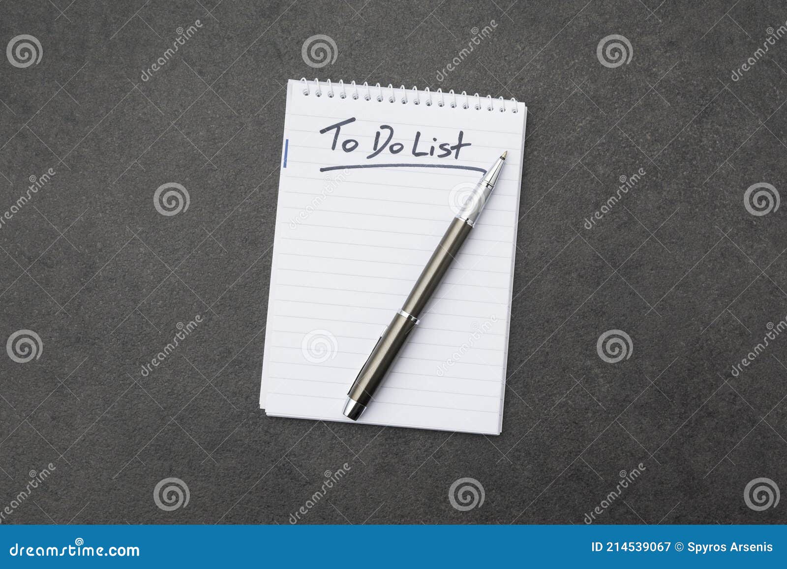 High Angle View of a Notepad with the To Do List and a Pen on Grey Desk ...