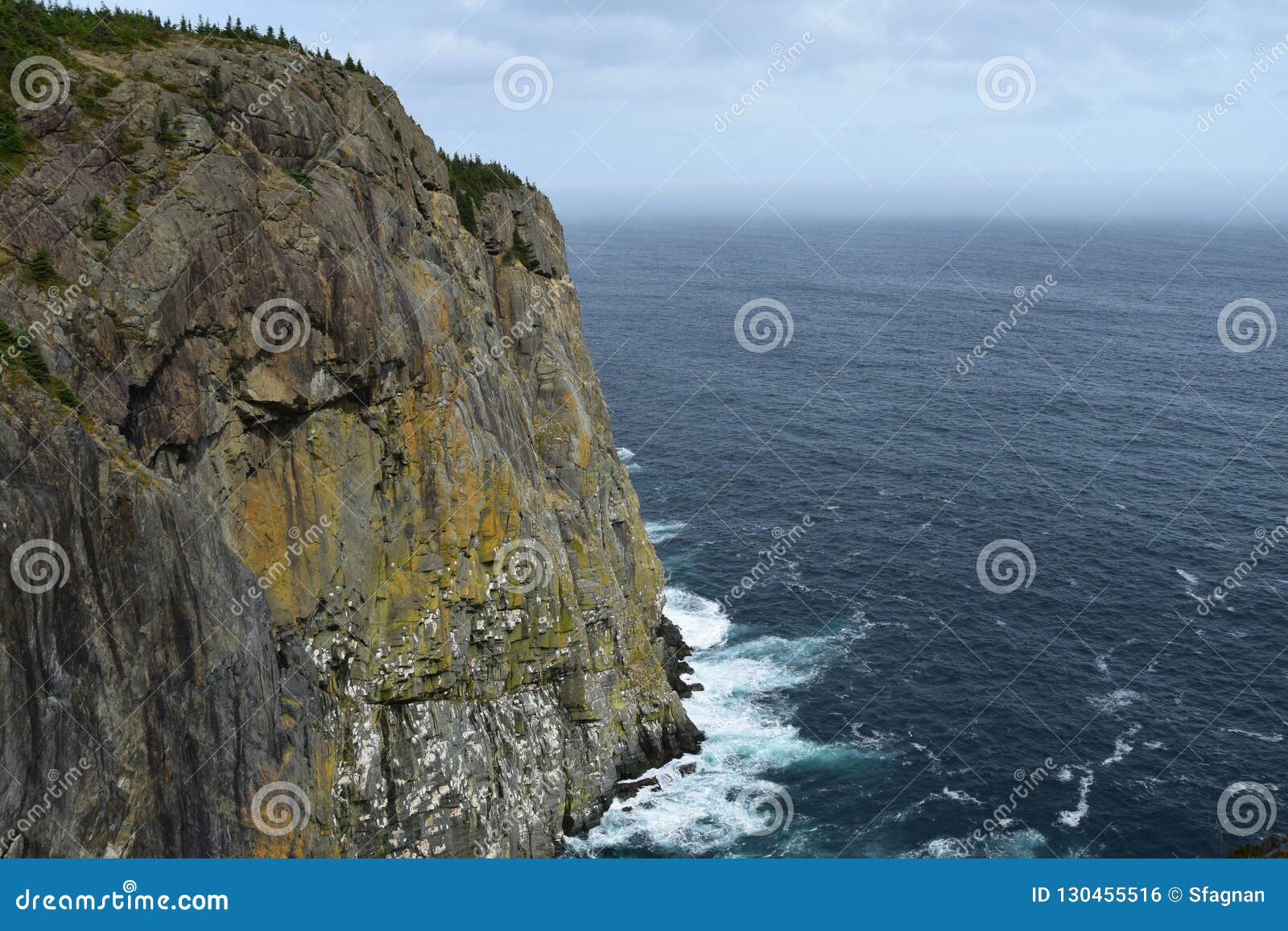 High Angle View Past a Cliff Towards the Ocean Stock Photo - Image of ...
