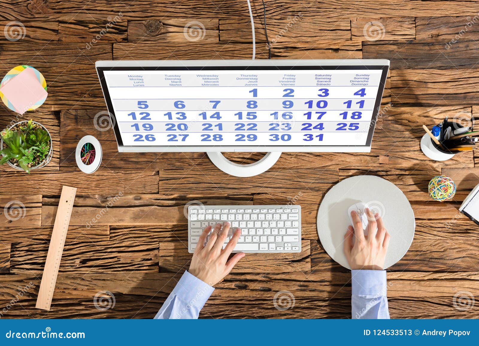 Person Using Computer with Calendar on Screen Stock Image - Image of ...