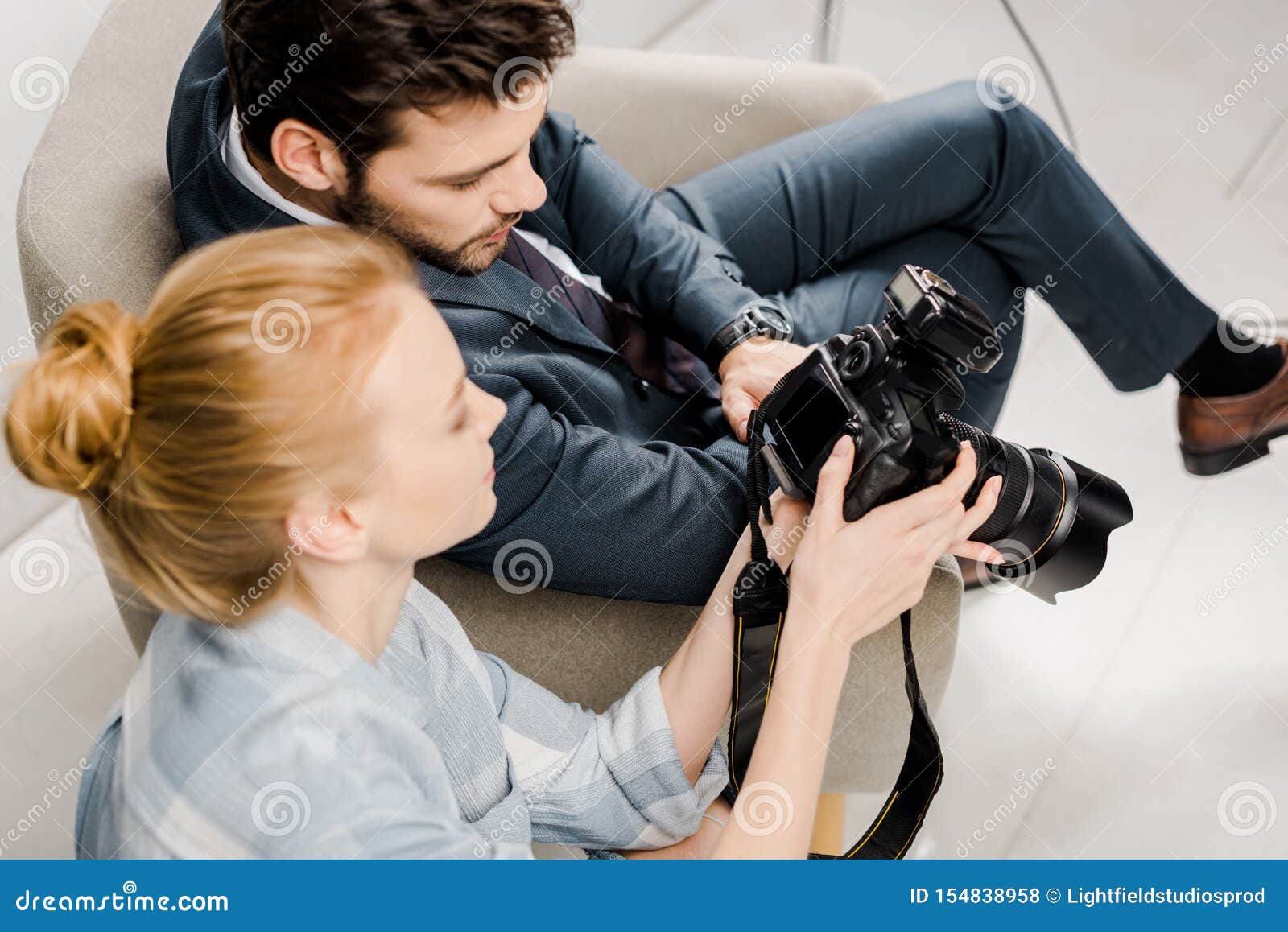 High Angle View of Photographer and Model Using Photo Camera Stock ...