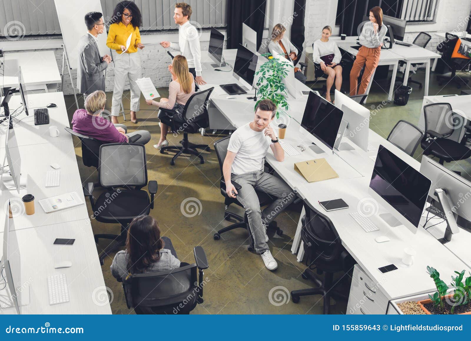 High Angle View of Professional Young Businesspeople Working with ...