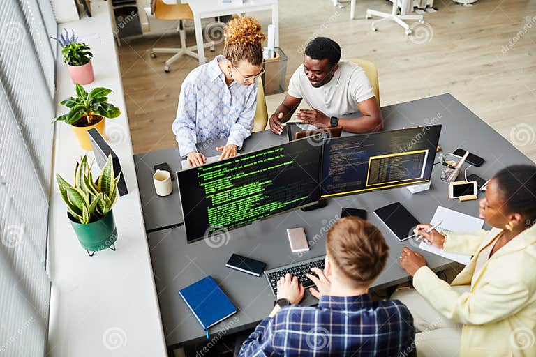 Team of Programmers Writing Codes Together Stock Photo - Image of ...