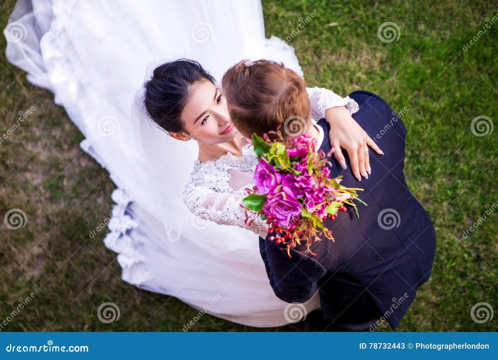 High Angle View of Romantic Wedding Couple on Grassy Field Stock Image ...