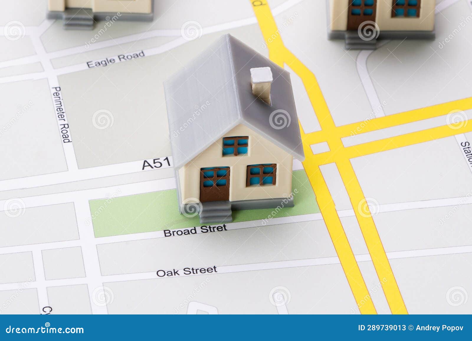 Small House Models on Map stock image. Image of road - 289739013