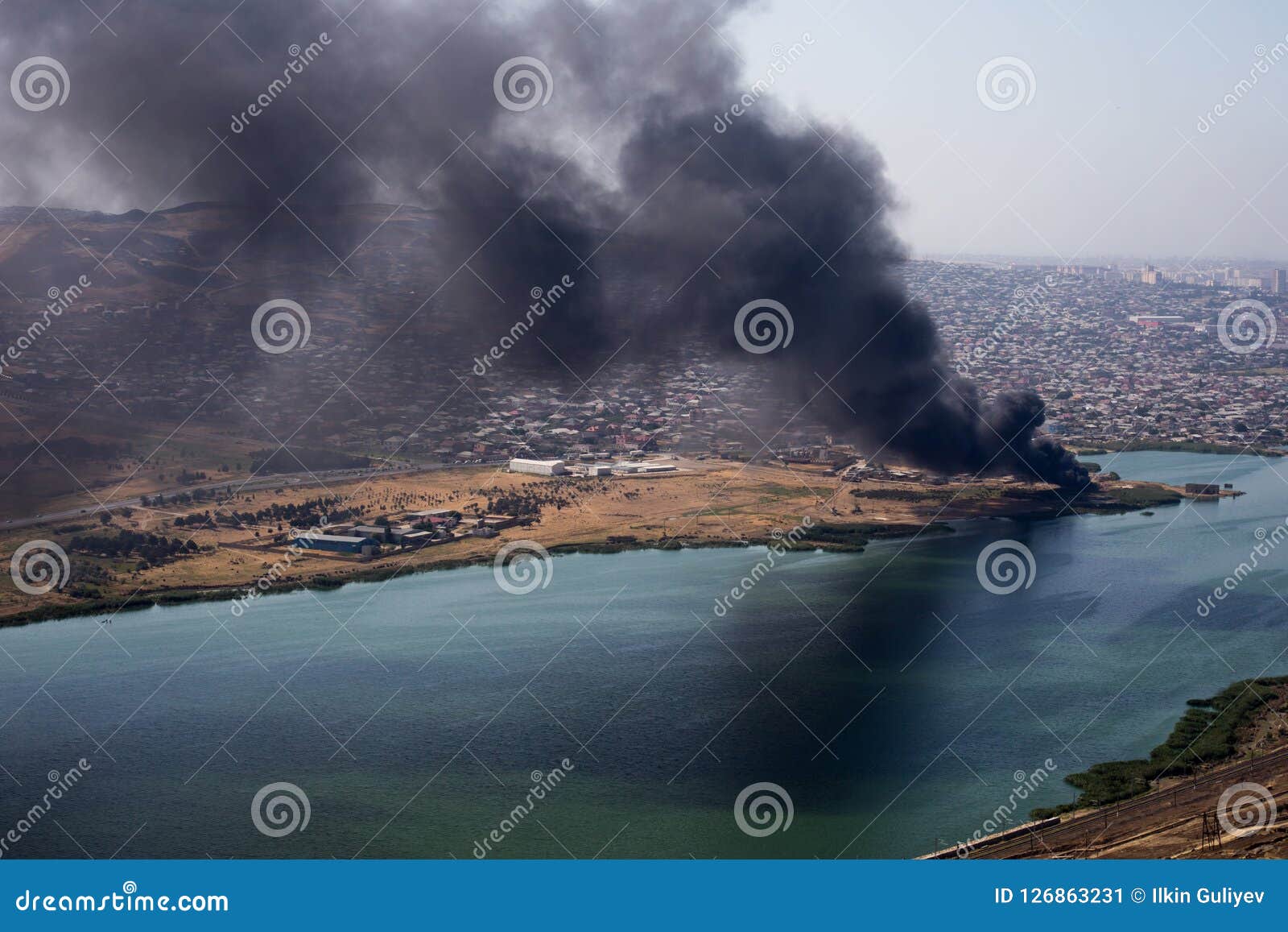 High Angle View of Smoke Spreading from Building. Arson of Industrial ...