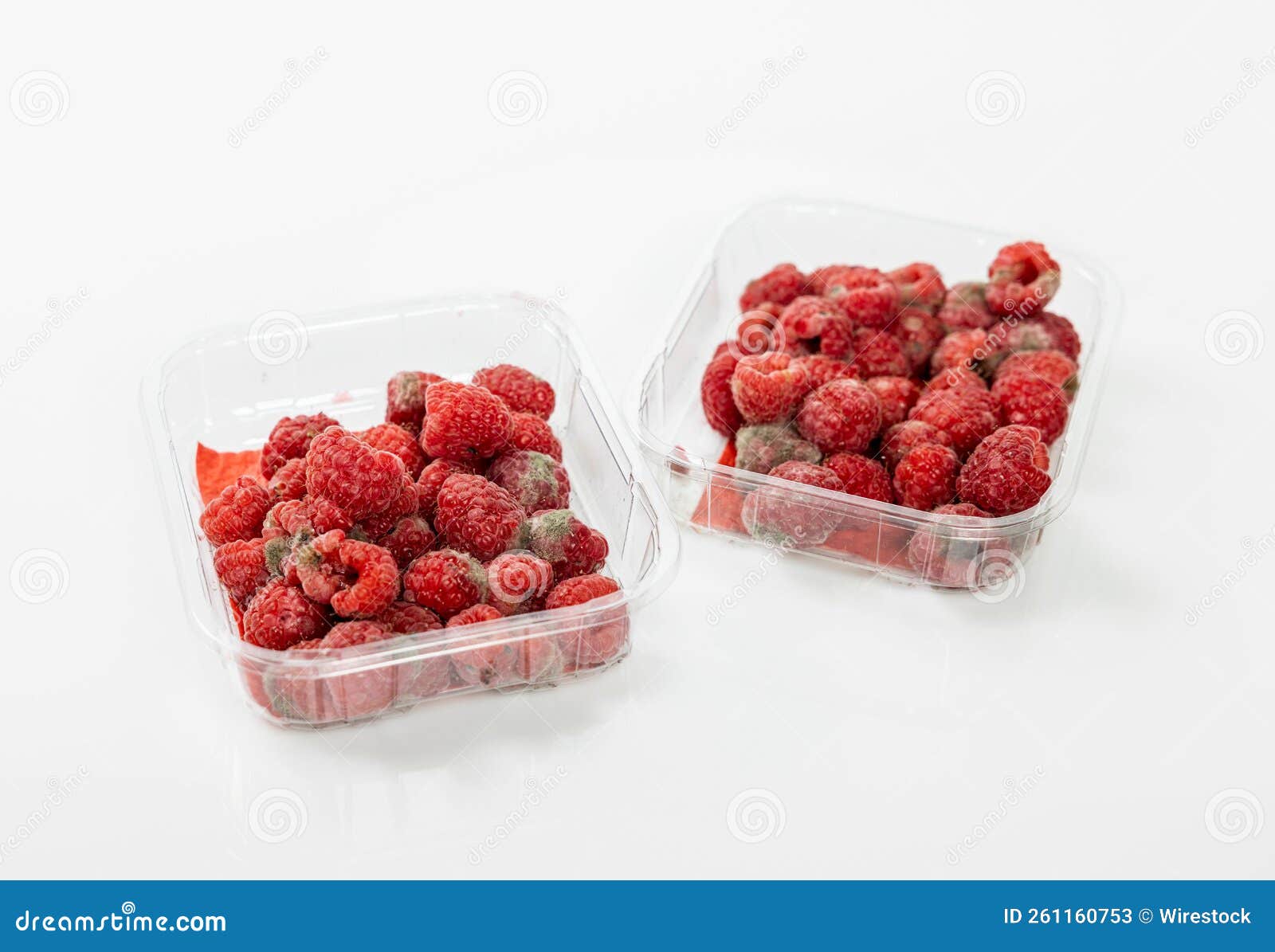 High-angle View of Spoilt Raspberries in Plastic Clamshell Containers ...