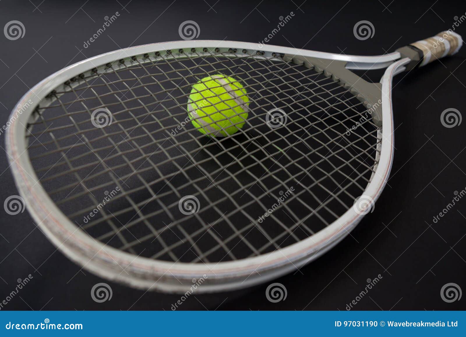 High Angle View Tennis Racket on Ball Stock Photo - Image of polyester ...