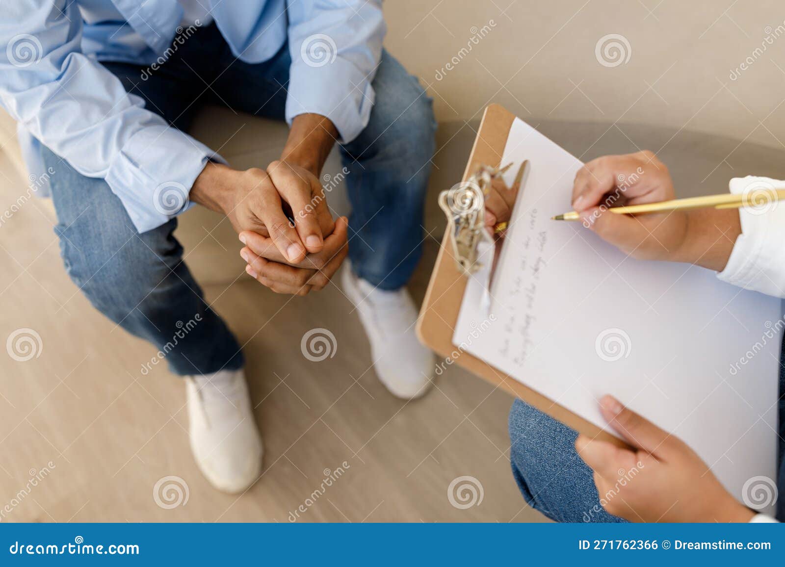 High Angle View of Therapist Taking Notes during Therapy Session Stock ...