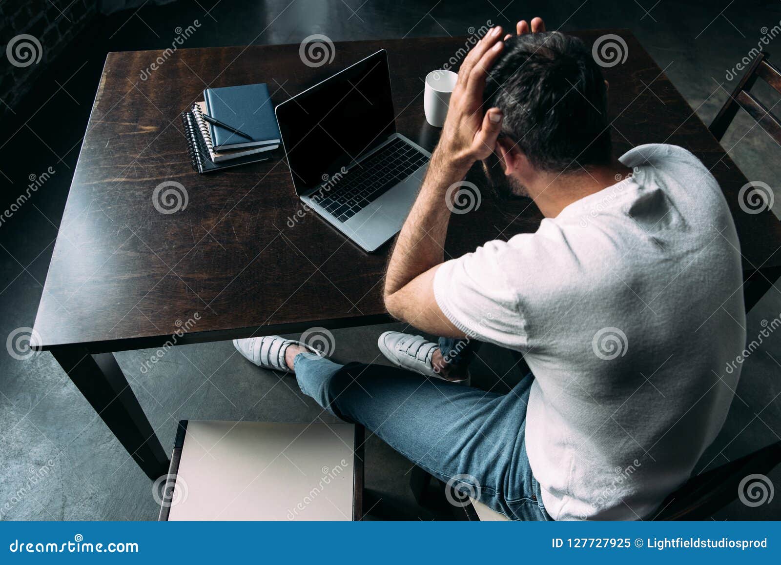 High Angle View of Tired Freelancer Remote Working at Table with Laptop ...