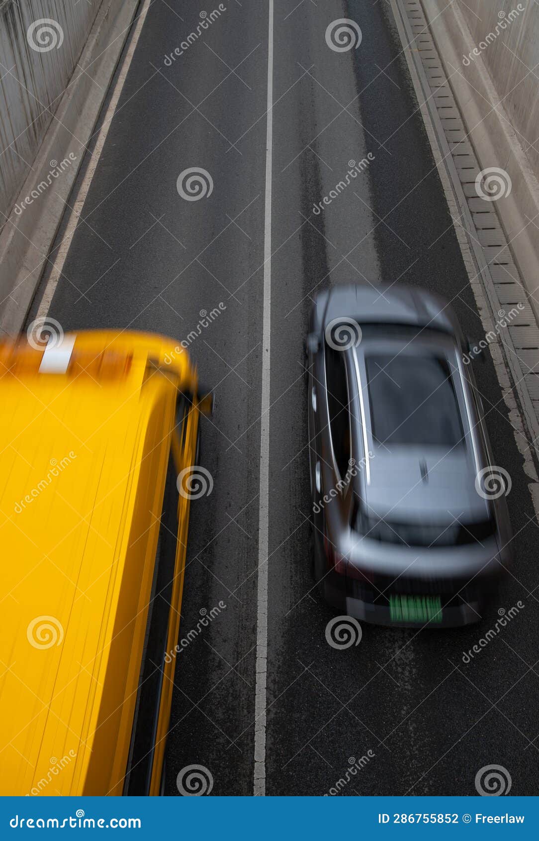 Two Cars Driving on Blacktop Stock Photo - Image of rough, backdrop ...