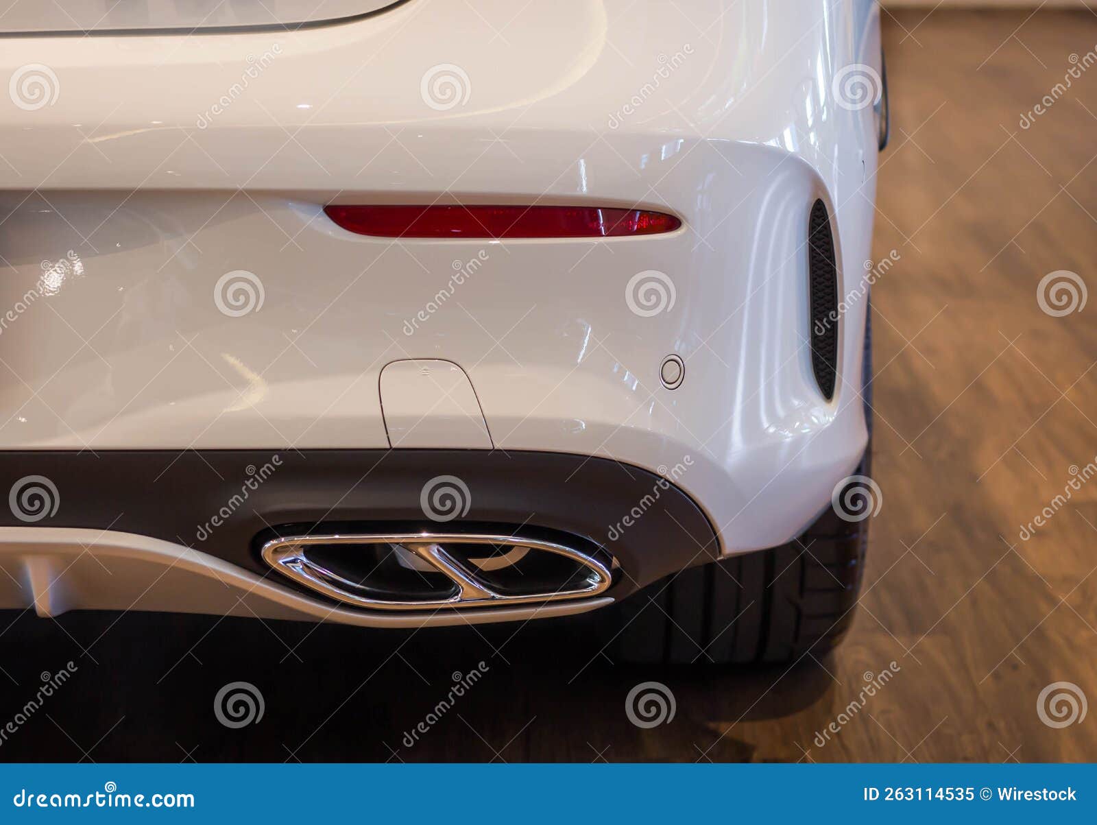 High-angle View of a White Mercedes Benz Exhaust Tips while Parked ...