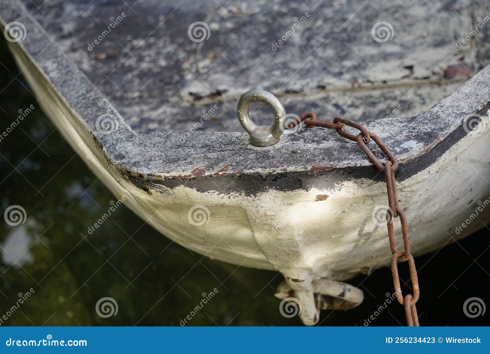 High-angle View of a Yellow Boat on the Water with a Rusty Chain Stock ...