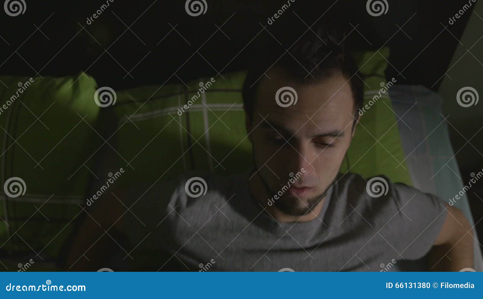 High Angle View of Young Handsome Man Waking Up Scared Stock Footage ...