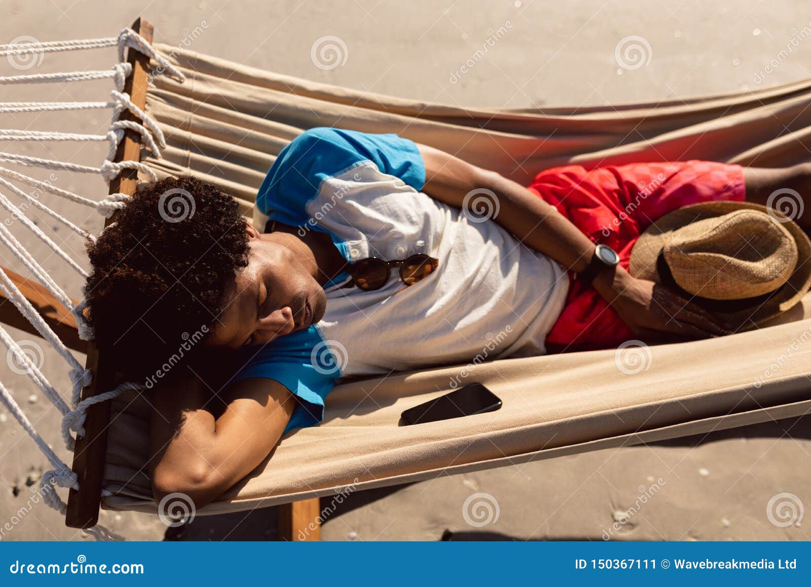 Man Sleeping in a Hammock on the Beach Stock Image - Image of calm ...