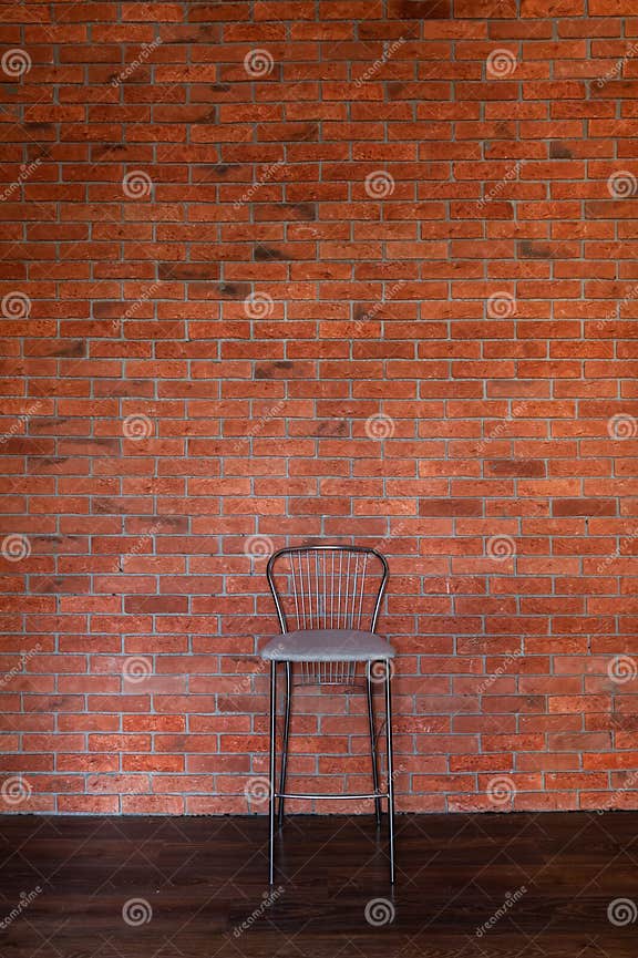 High Bar Stool Against a Brick Wall Stock Image - Image of architecture ...