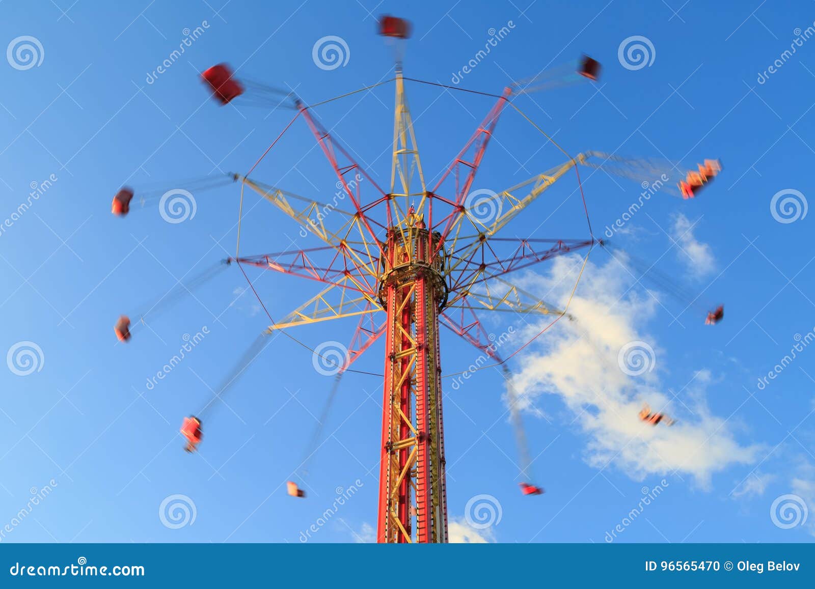 High Carousel is Whirling on the Background of Blue Sky Stock Photo ...