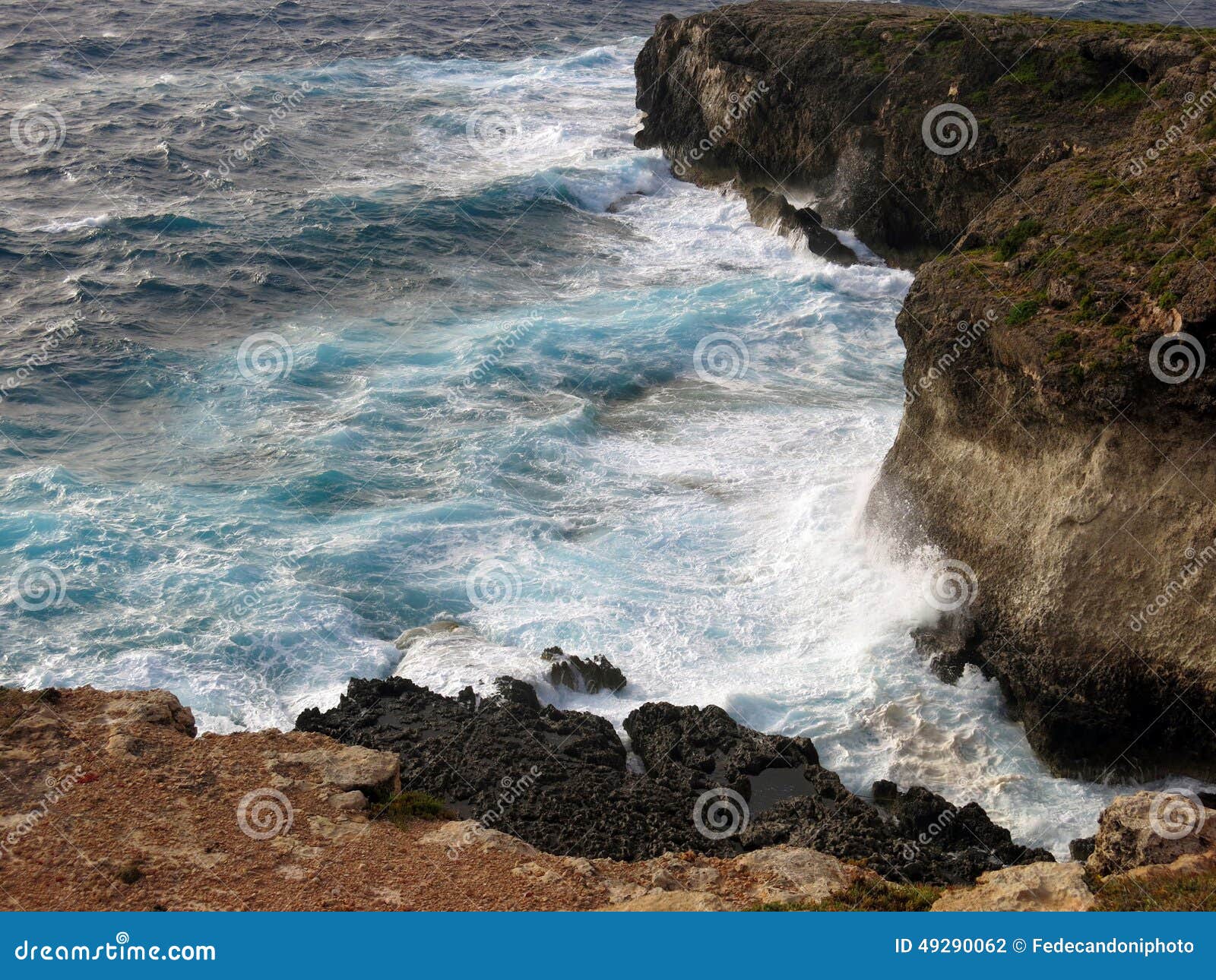 High Cliff on the Sea with Waves Stock Photo - Image of rough, high ...