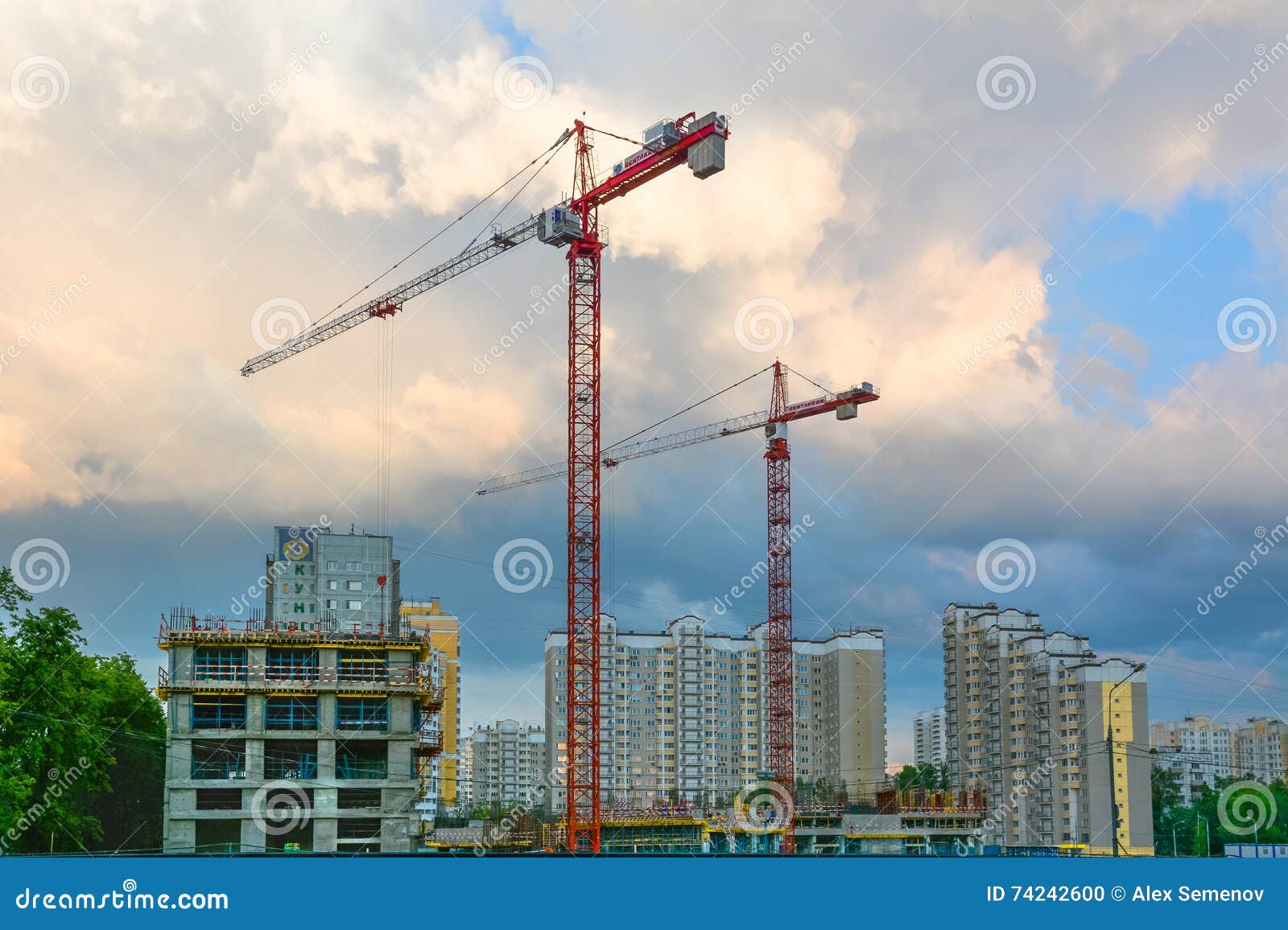 High Construction Cranes on a Construction Site Stock Photo - Image of ...