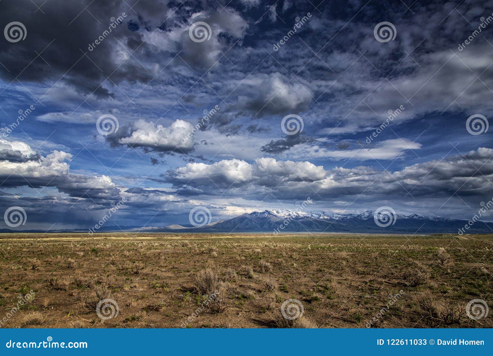 Far Away Mountain on a Prarie with Clouds Stock Image - Image of purple ...