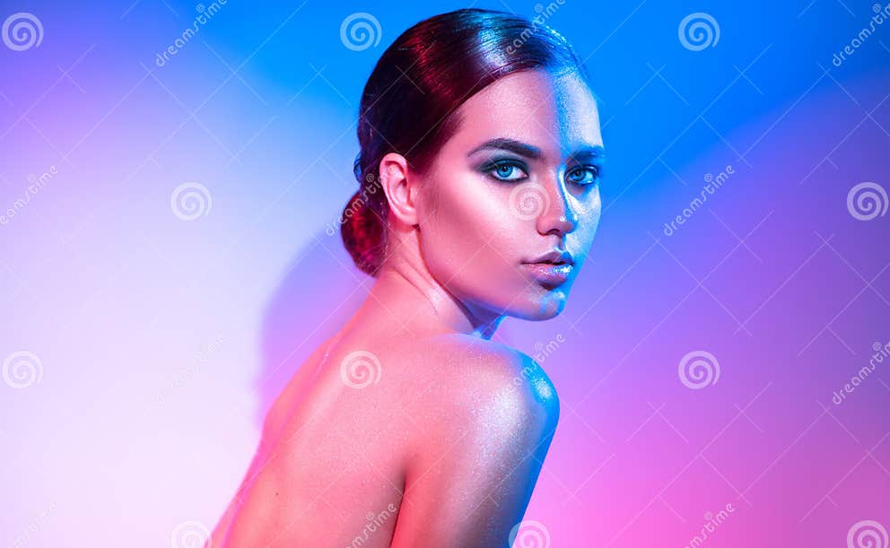 High Fashion Model Girl In Colorful Bright Sparkles And Neon Lights