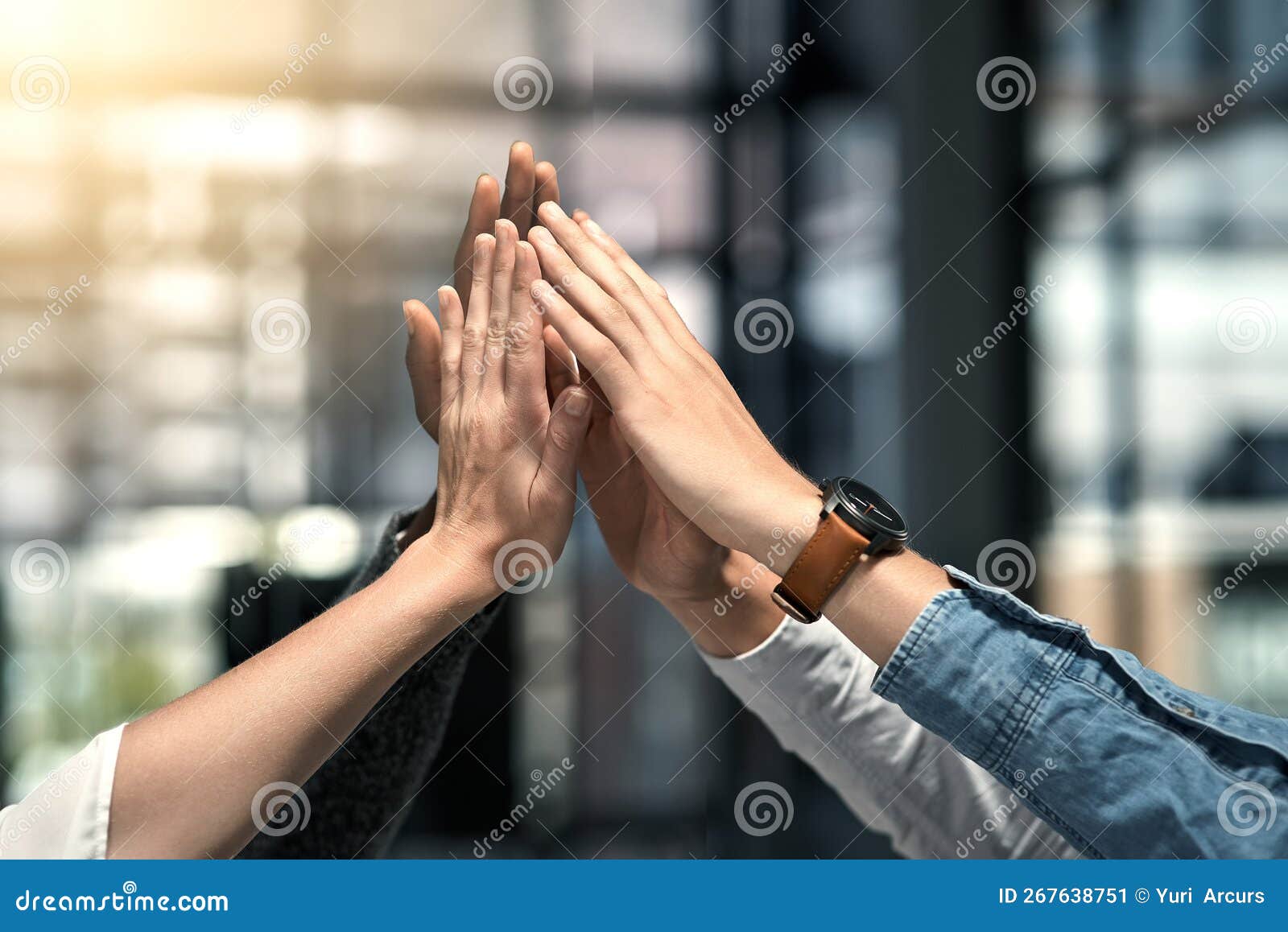 High Five for Teamwork. a Group of Businesspeople Joining Their Hands ...