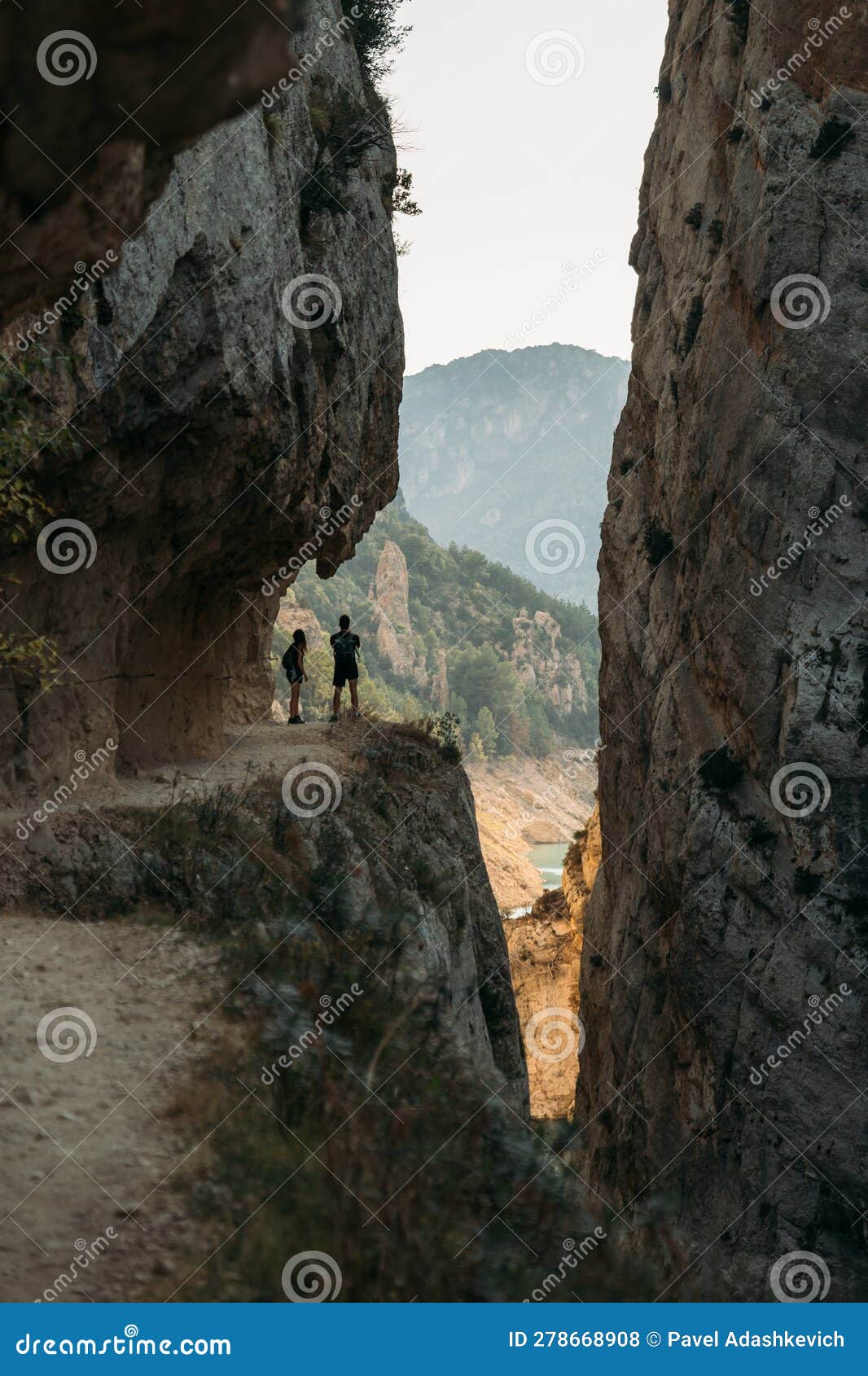 A High Gorge with People Taking Photos of Canyon on the Path Inside the ...