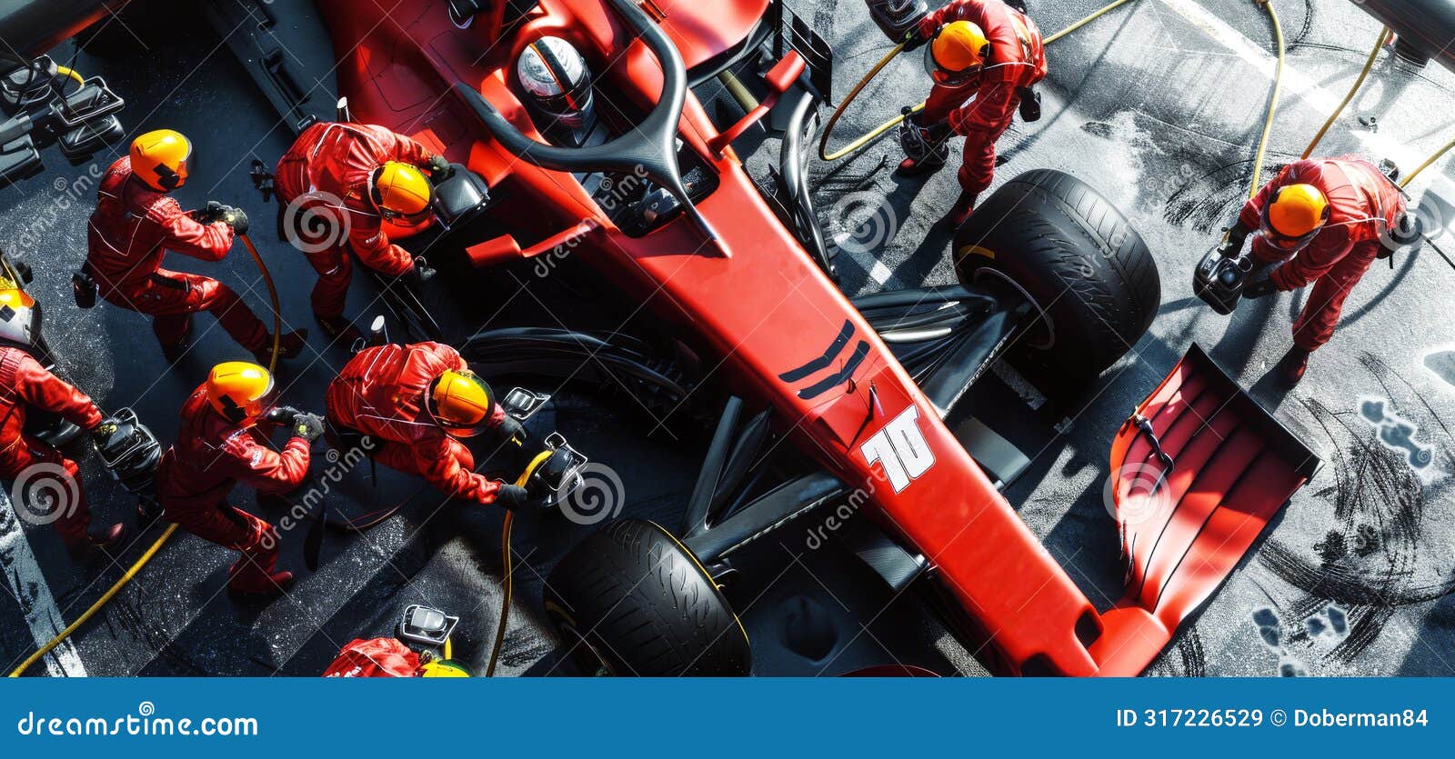 High-Intensity Pit Stop Scene with Team Mechanics Servicing a Formula ...