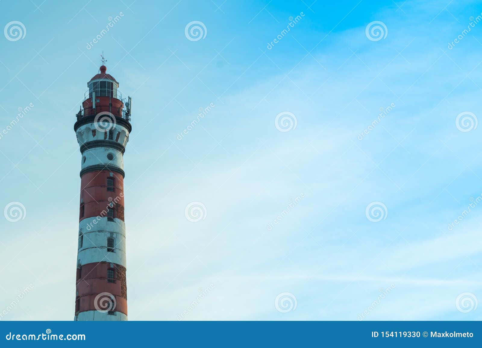 High Lighthouse in the Forest Landscape. Red and White Lighthouse Stock ...