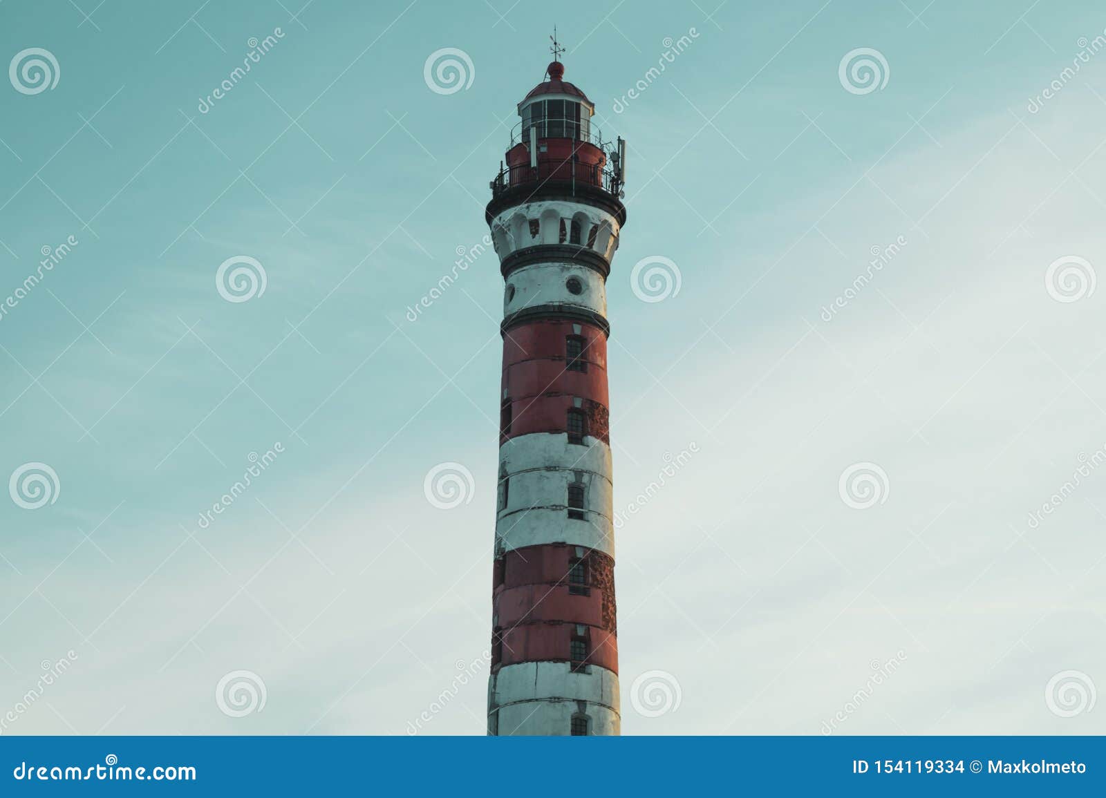 High Lighthouse in the Forest Landscape. Red and White Lighthouse Stock ...