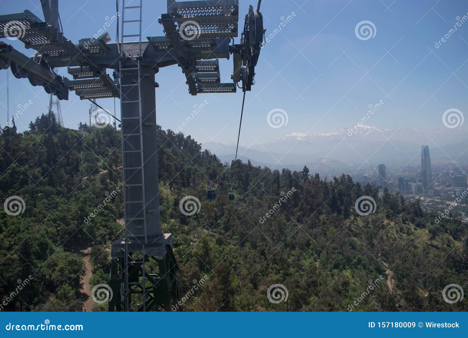 High Metal Tower of a Chairlift Construction with a Forest Below Stock ...