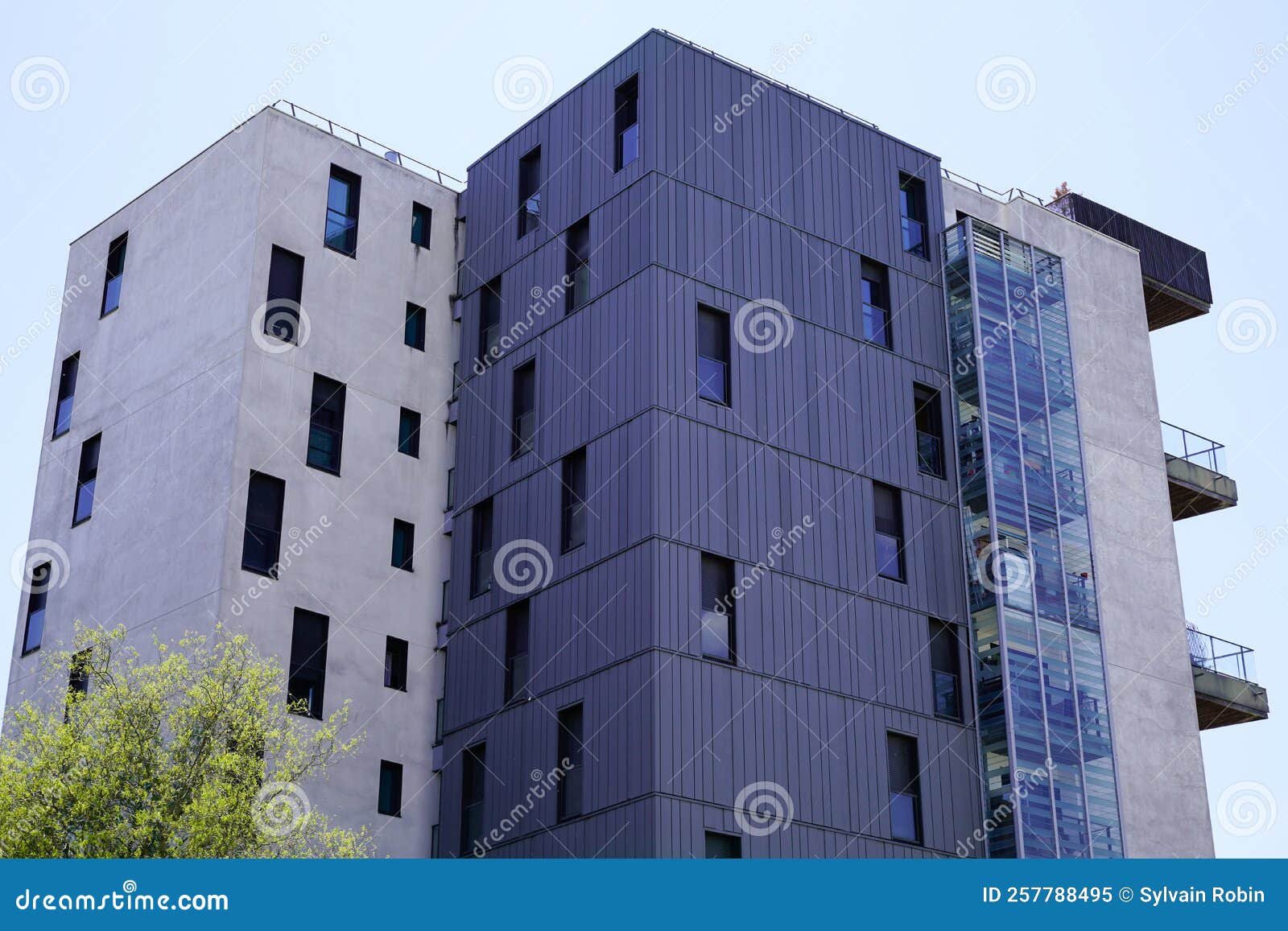 High Modern White Line Facade Grey Building With Balcony In City Stock ...