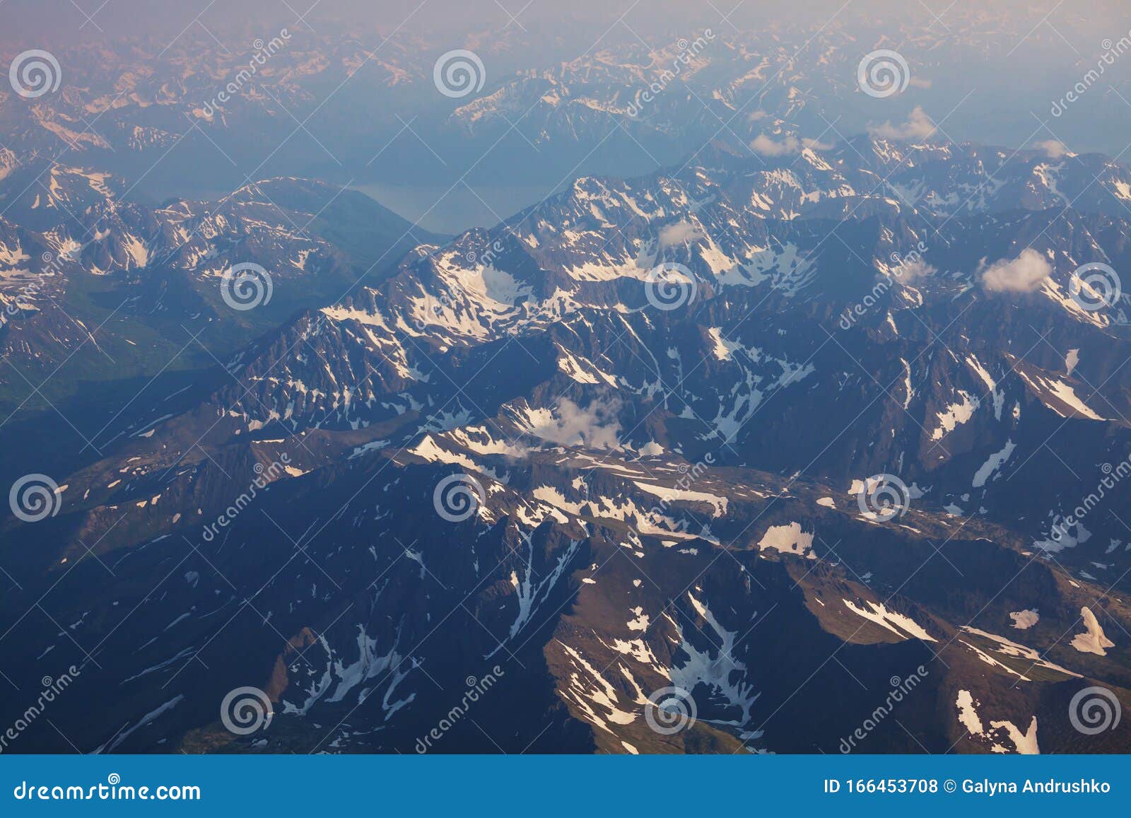 Above mountains stock photo. Image of gorgeous, mountainous - 166453708