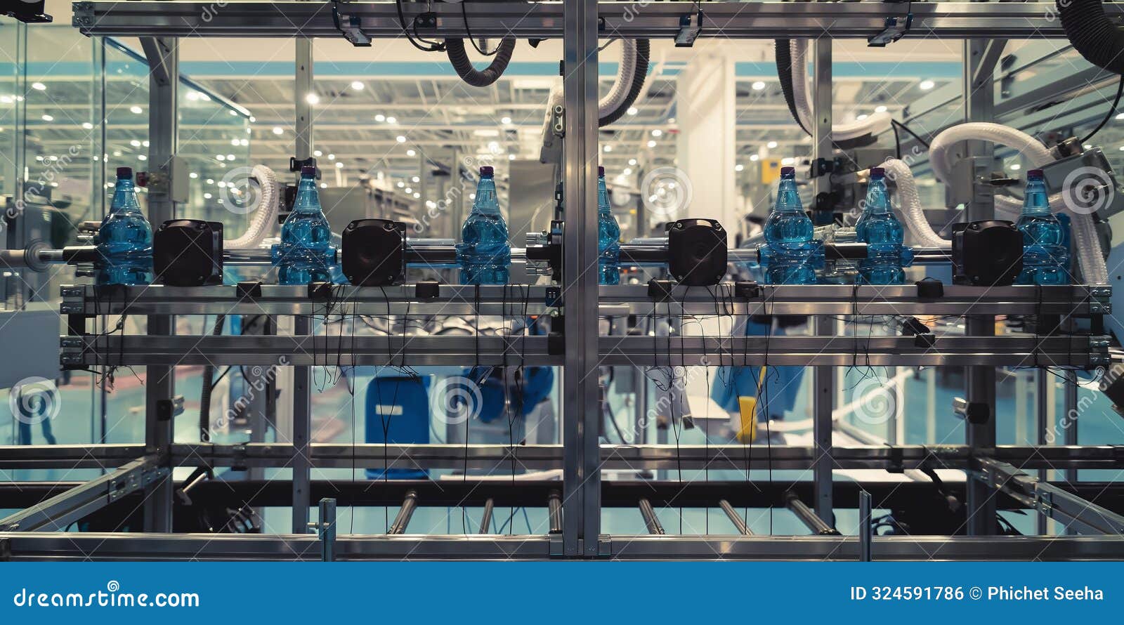 High-Precision Automated Bottling Process in a Modern Manufacturing ...