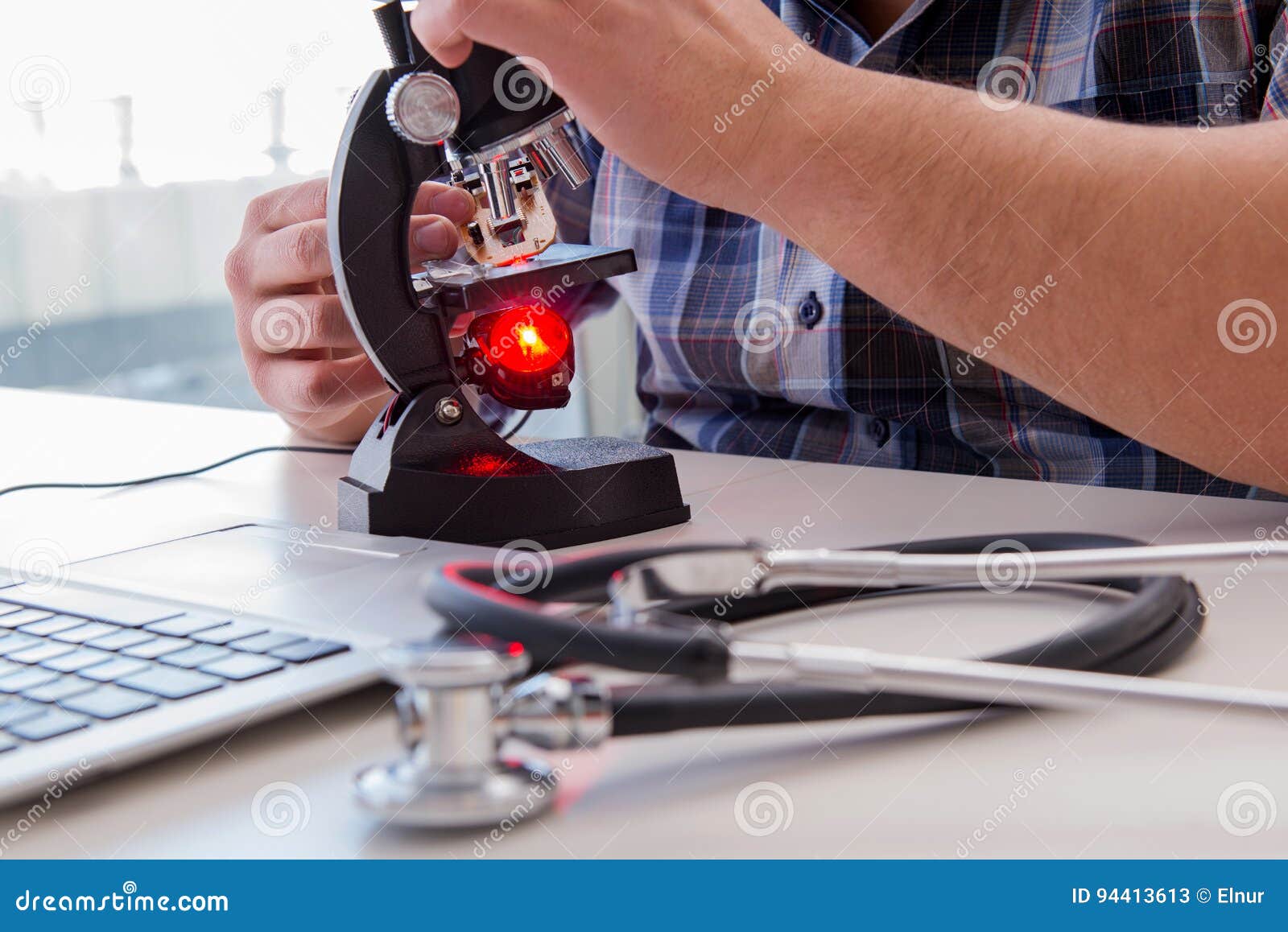 The High Precision Engineering with Man Working with Microscope Stock ...