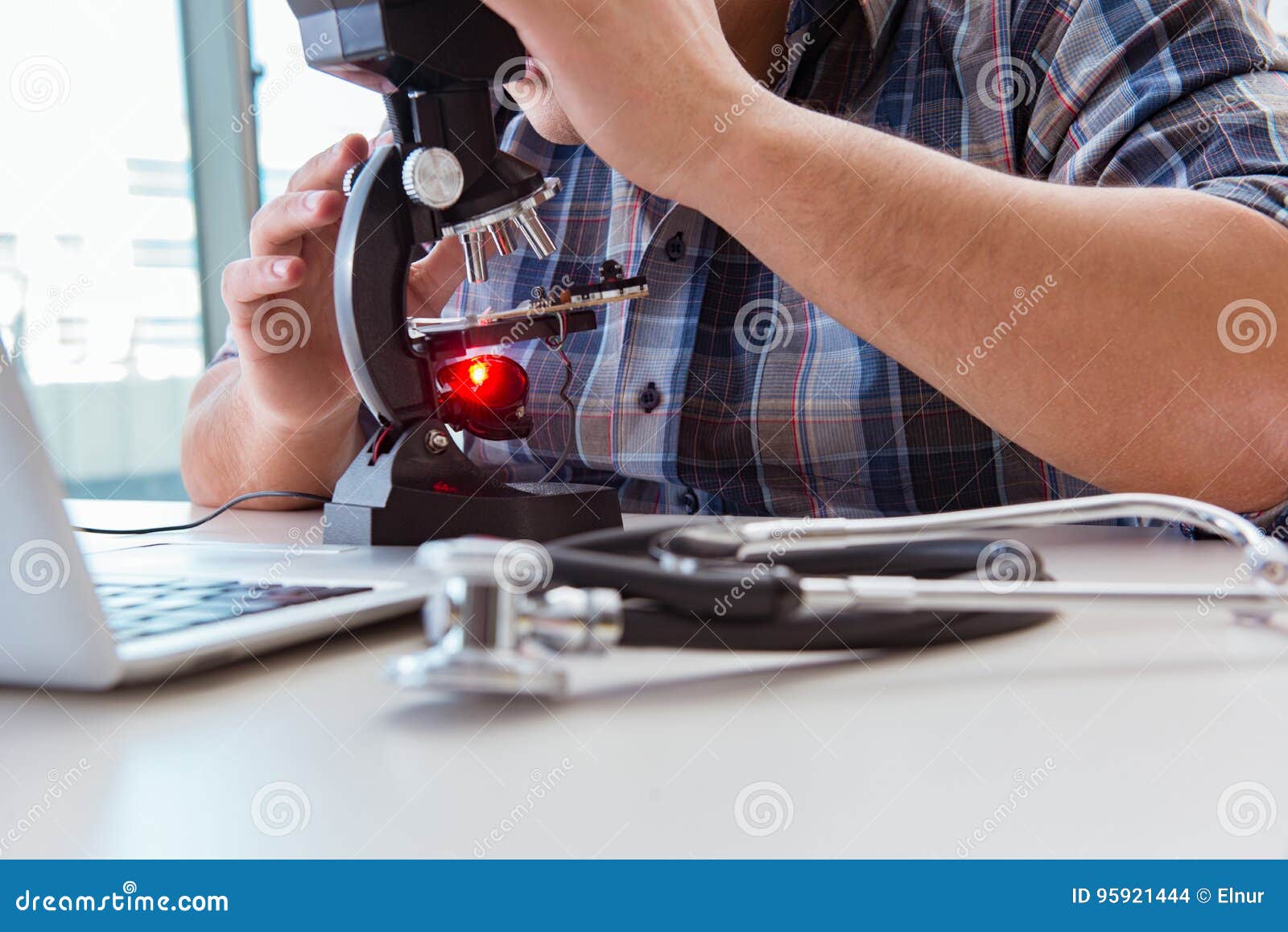 The High Precision Engineering with Man Working with Microscope Stock ...