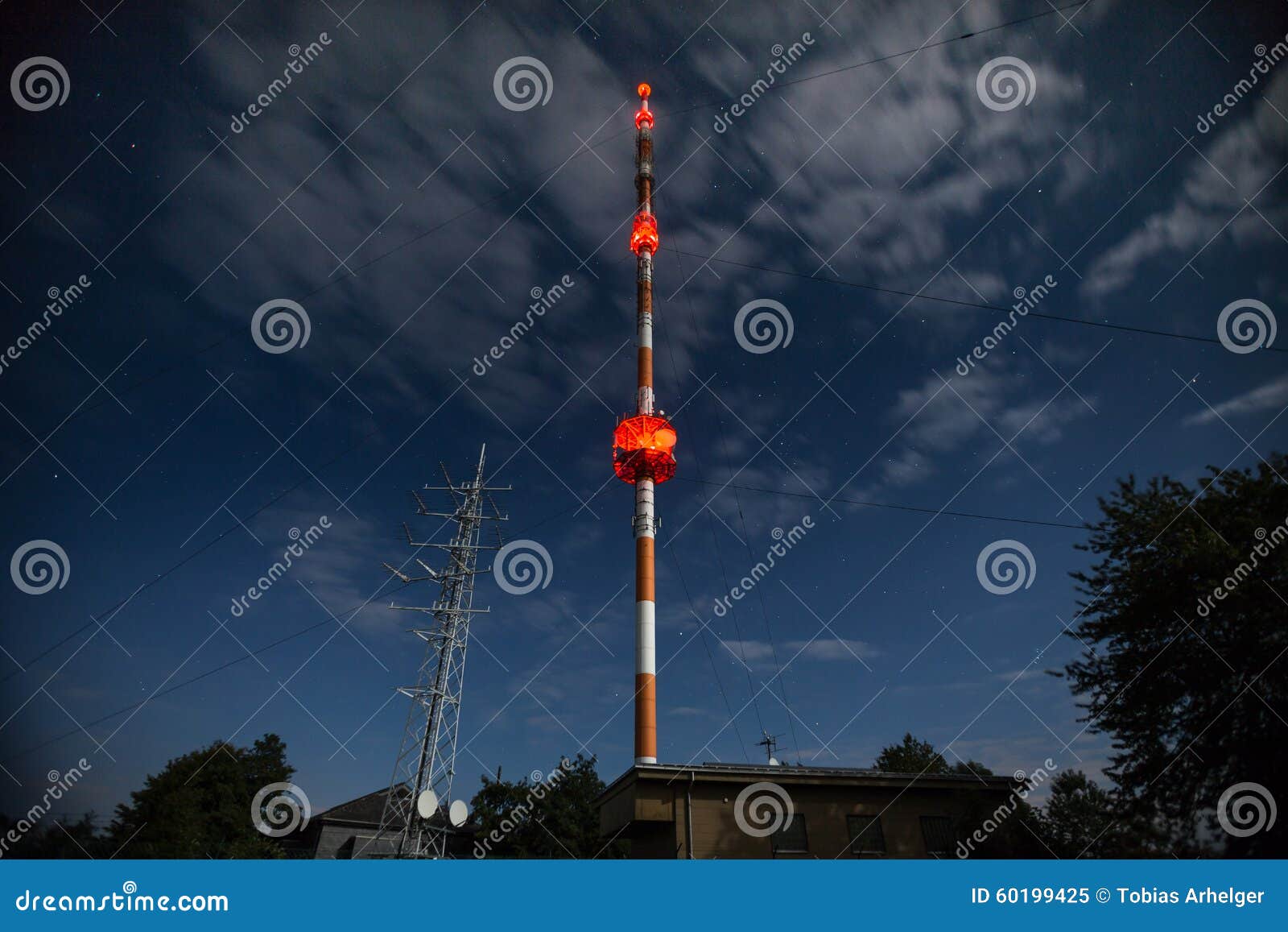High radio tower at night stock image. Image of hill - 60199425