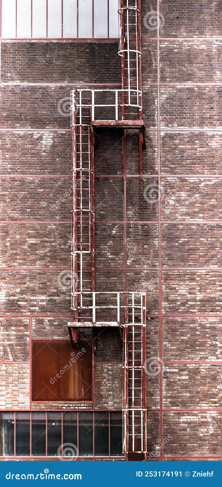 High Red and White Iron Staircase with Intermediate Platforms of ...