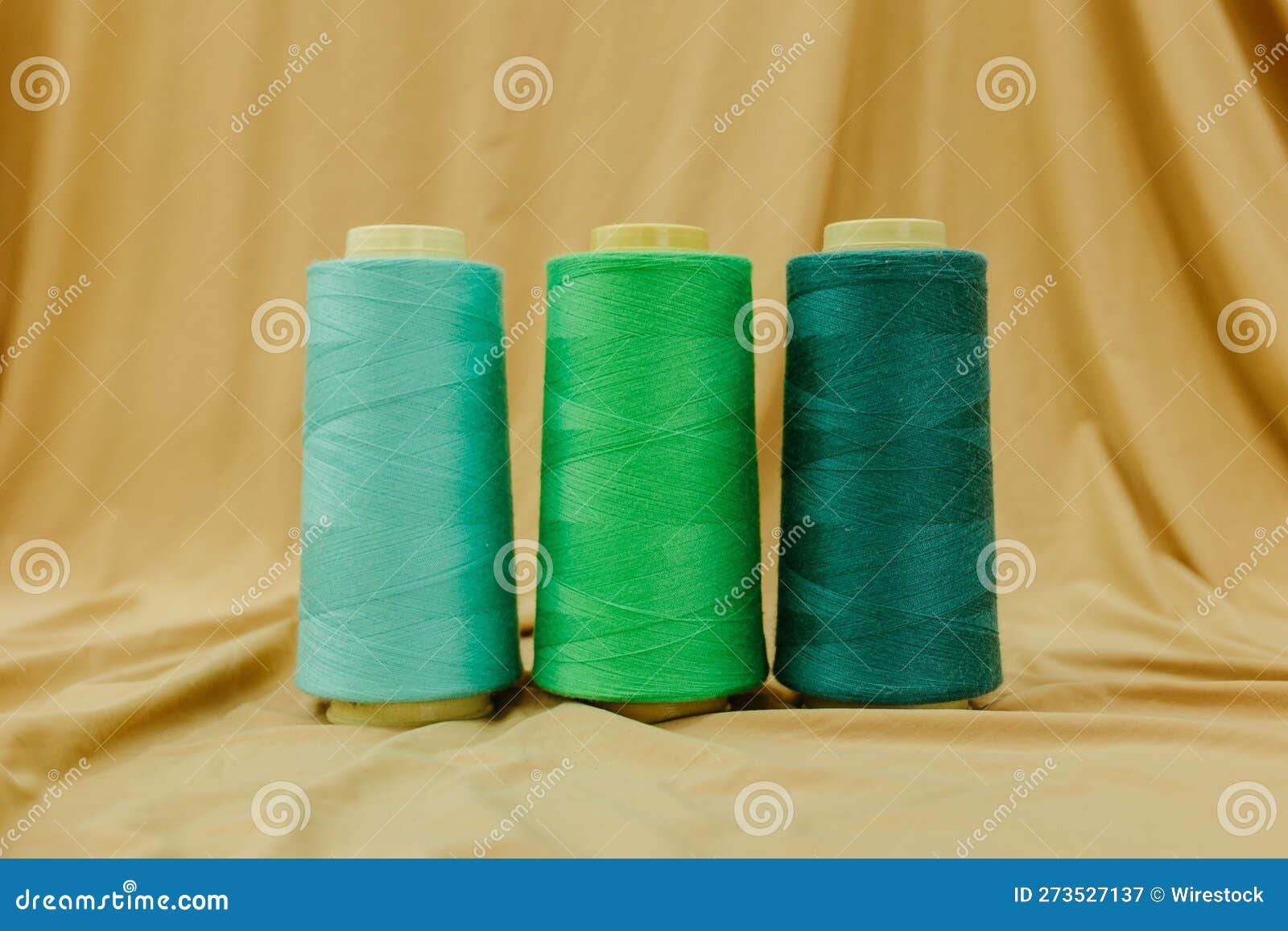 High-resolution Closeup Shot of Three Differently Colored Spool Threads ...