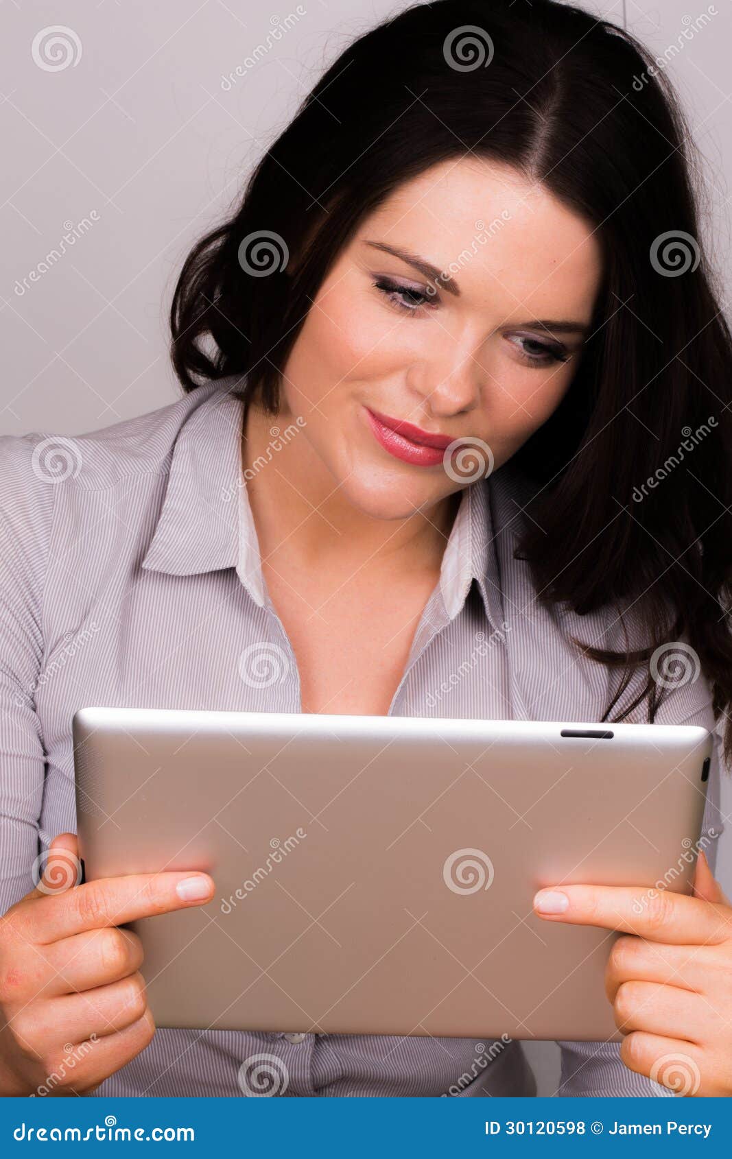 Beautiful Young Female Using an Ipad Tablet Device Stock Photo - Image ...
