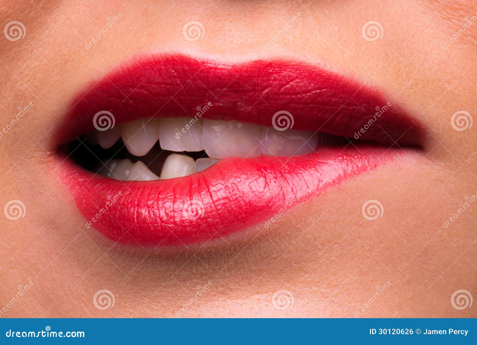 Female Lips with Red Lipstick Biting Stock Photo - Image of lips, youth ...