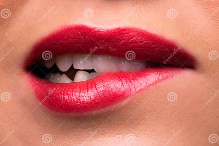 Female Lips with Red Lipstick Biting Stock Photo - Image of lips, youth ...