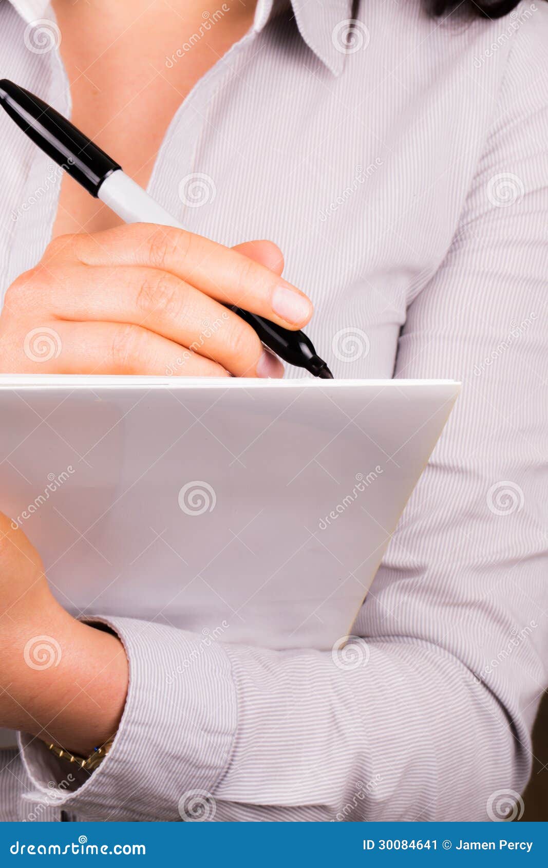 Young Professional Female Taking Notes Stock Image - Image of pinstripe ...