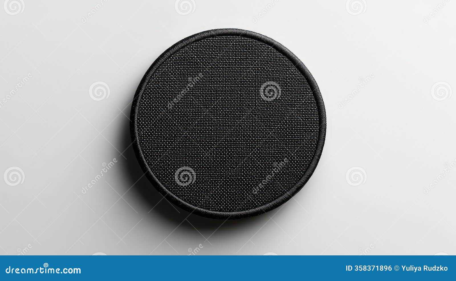 High-Resolution Mockup of a Standalone Rounded Embroidered Black Patch ...
