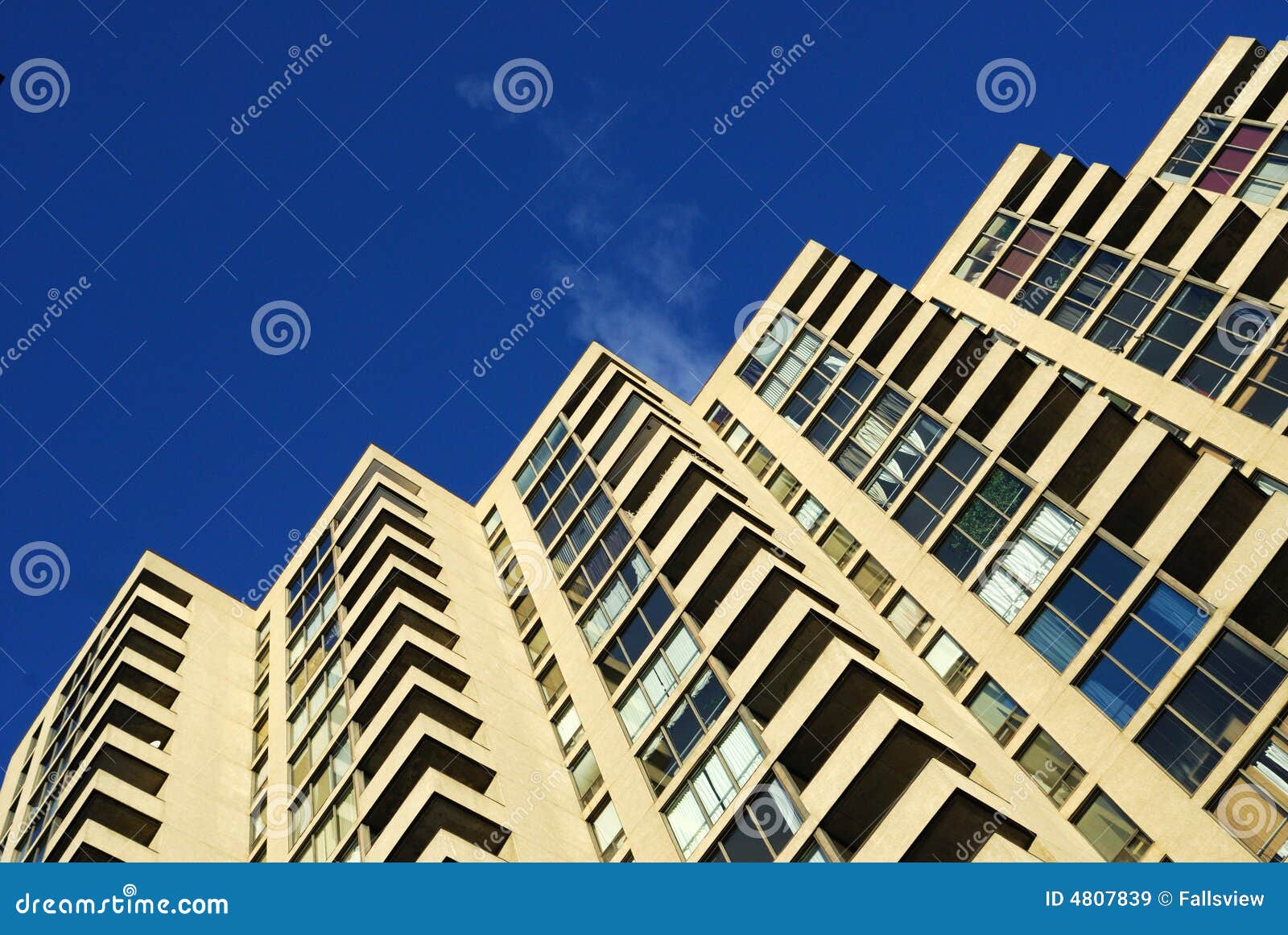 High Rise Apartment Building Stock Image - Image of colorful, windows ...