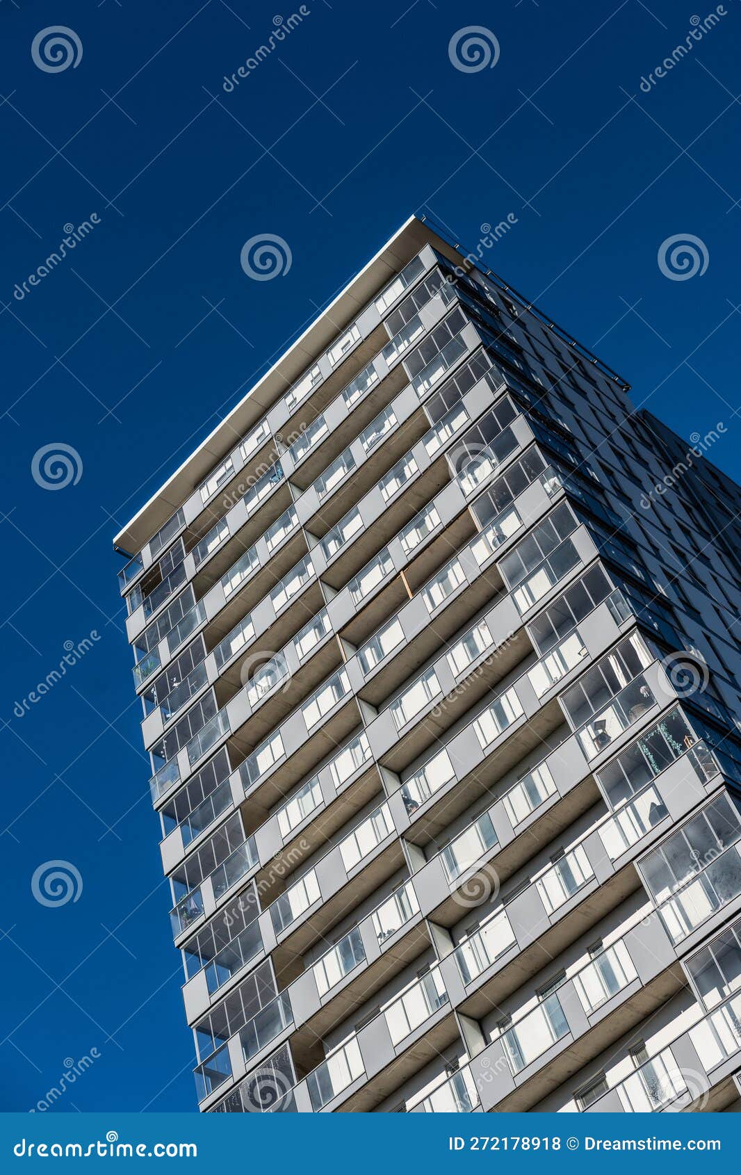 High Rise Apartment Building Against Blue Sky.. Stock Photo - Image of ...