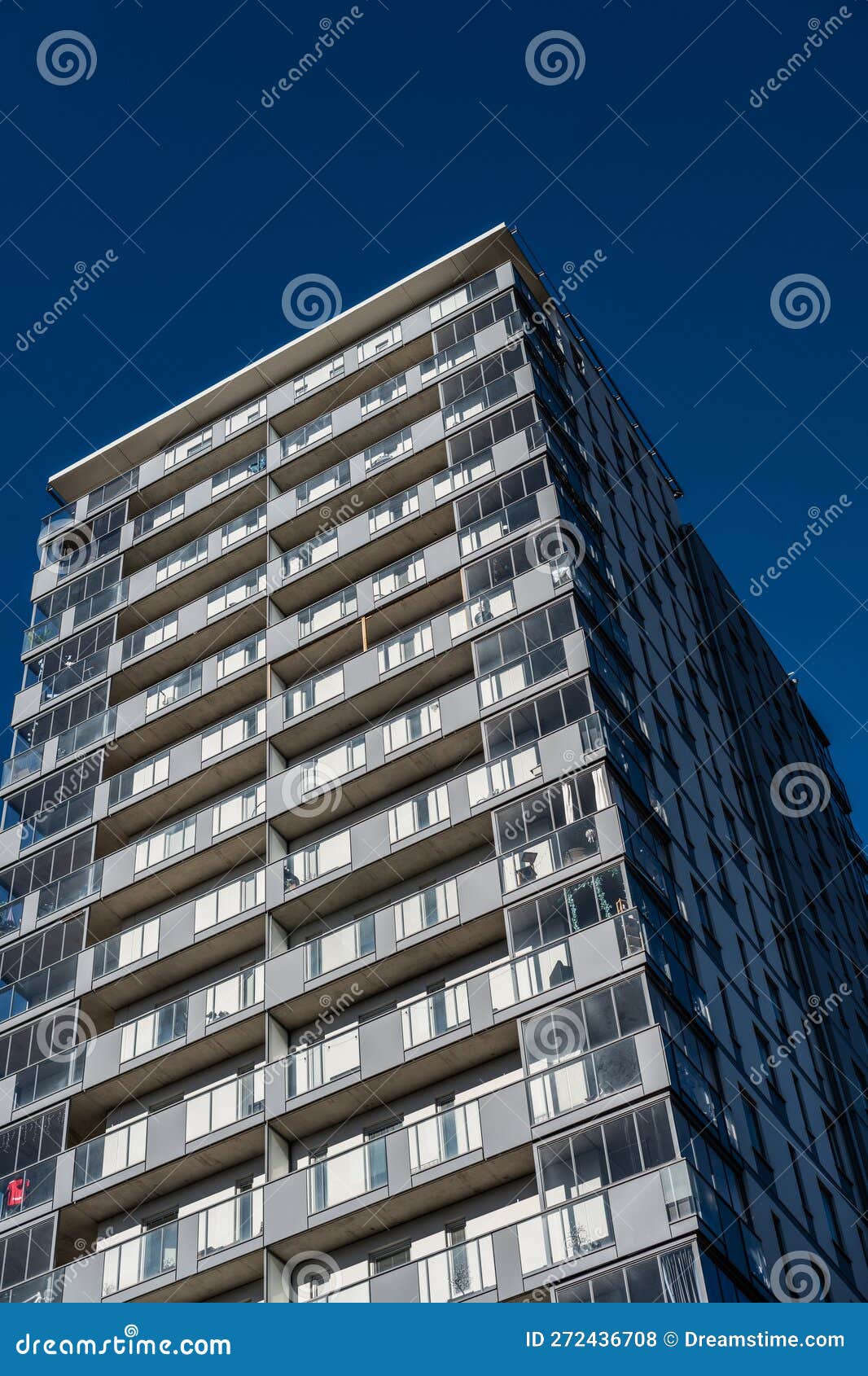 High Rise Apartment Building Against Blue Sky.. Stock Photo - Image of ...